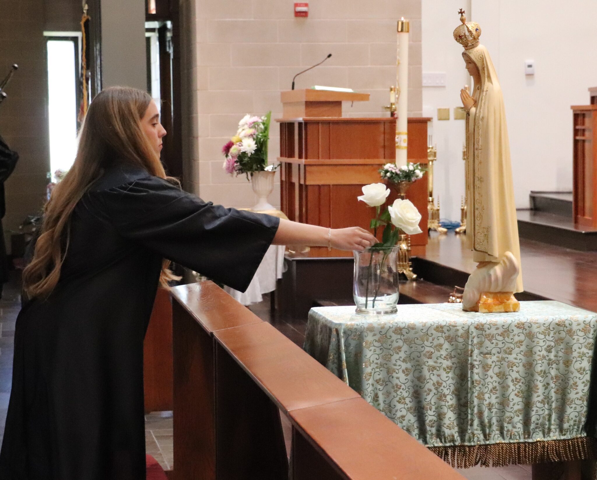 High school students graduate from Ave Maria Parish school - Diocese of ...